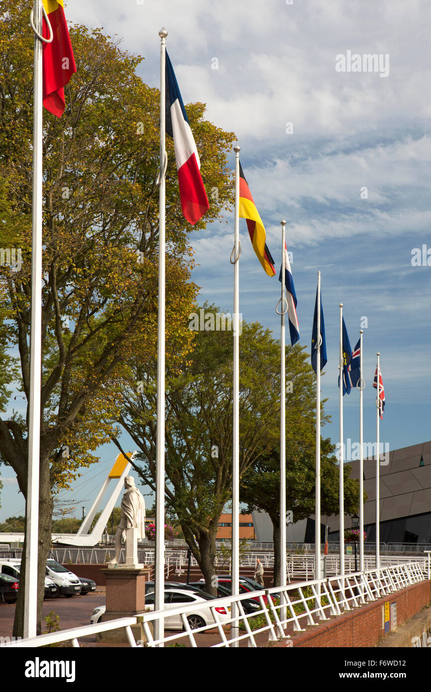 UK, England, Yorkshire, Hull, Nelson Street, flags along waterfront at ...