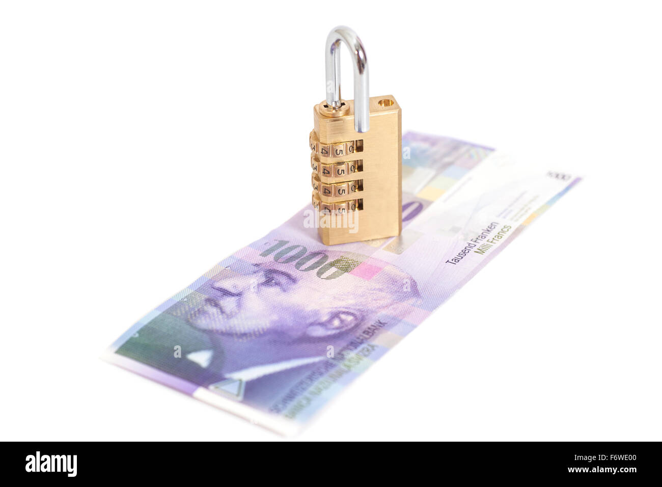 Combination padlock on Swiss francs, currency of switzerland Stock ...