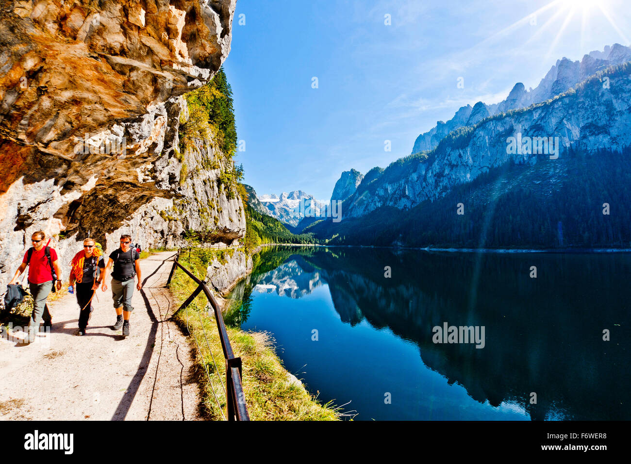 Hikers at lake Gosausee, Salzkammergut, Upper Austria, Austria Stock ...