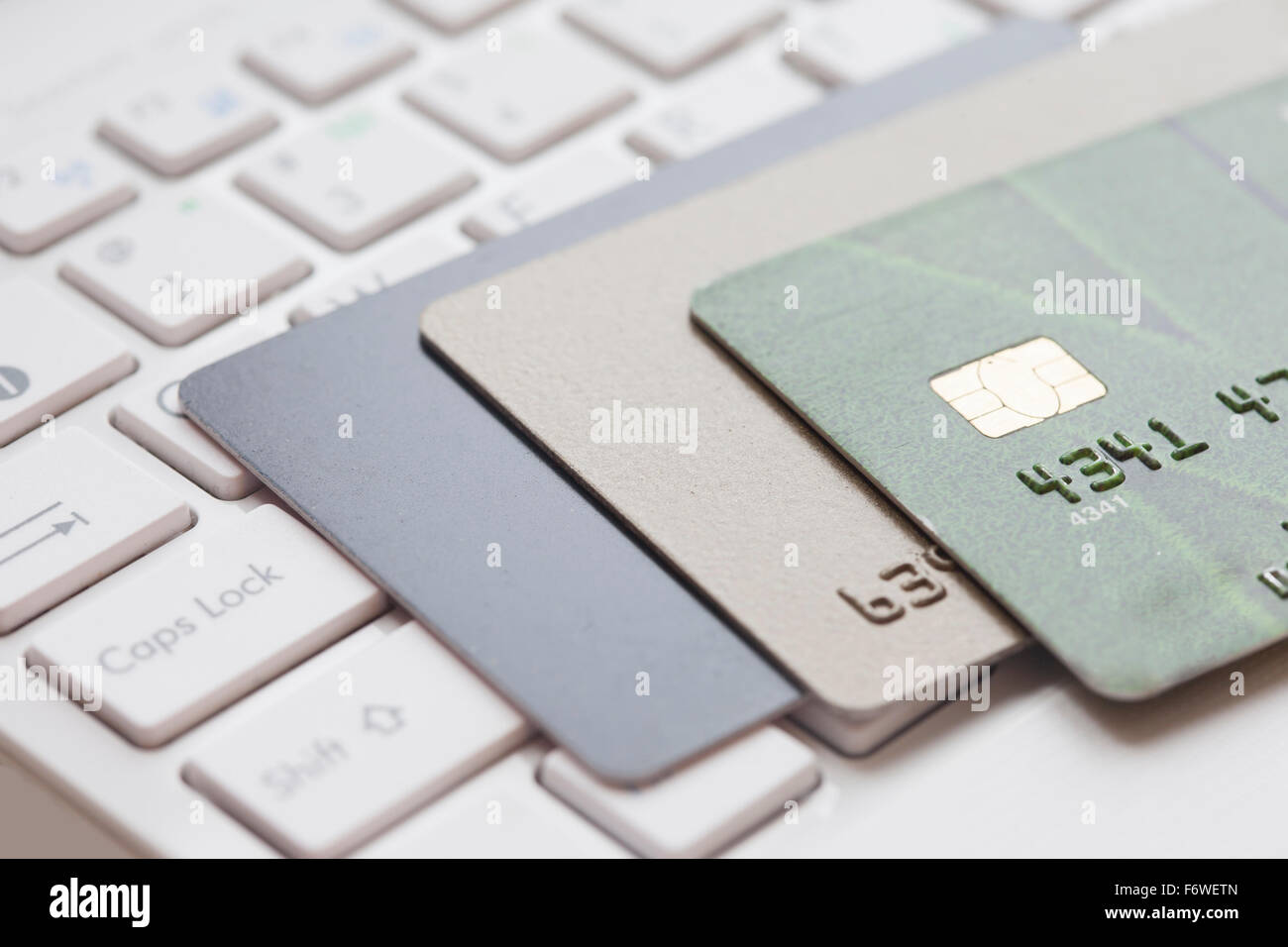 Bank card on computer keyboard Stock Photo - Alamy