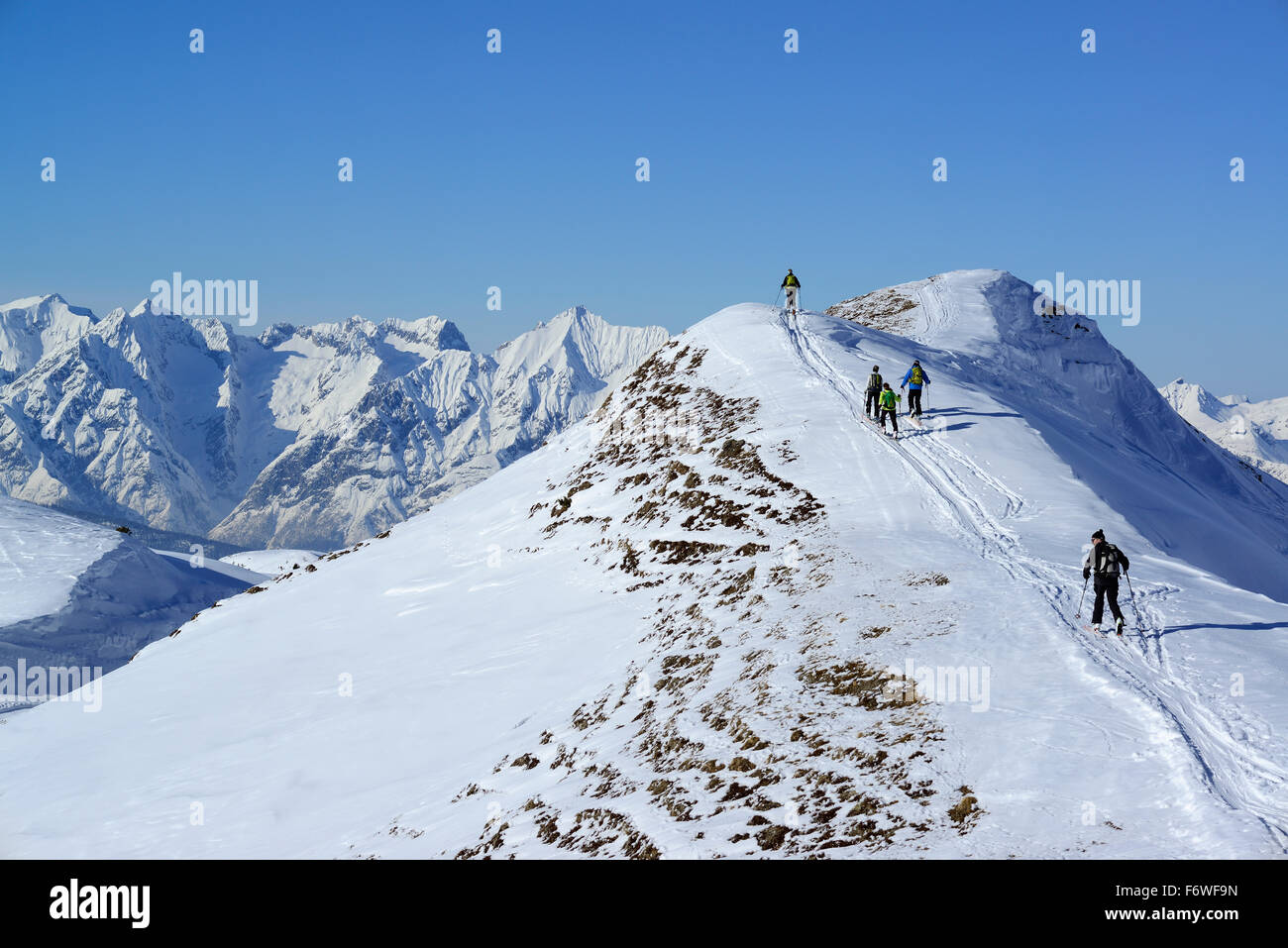 Group of backcountry skiers ascending to Hoher Kopf, Tux Alps, Tyrol ...
