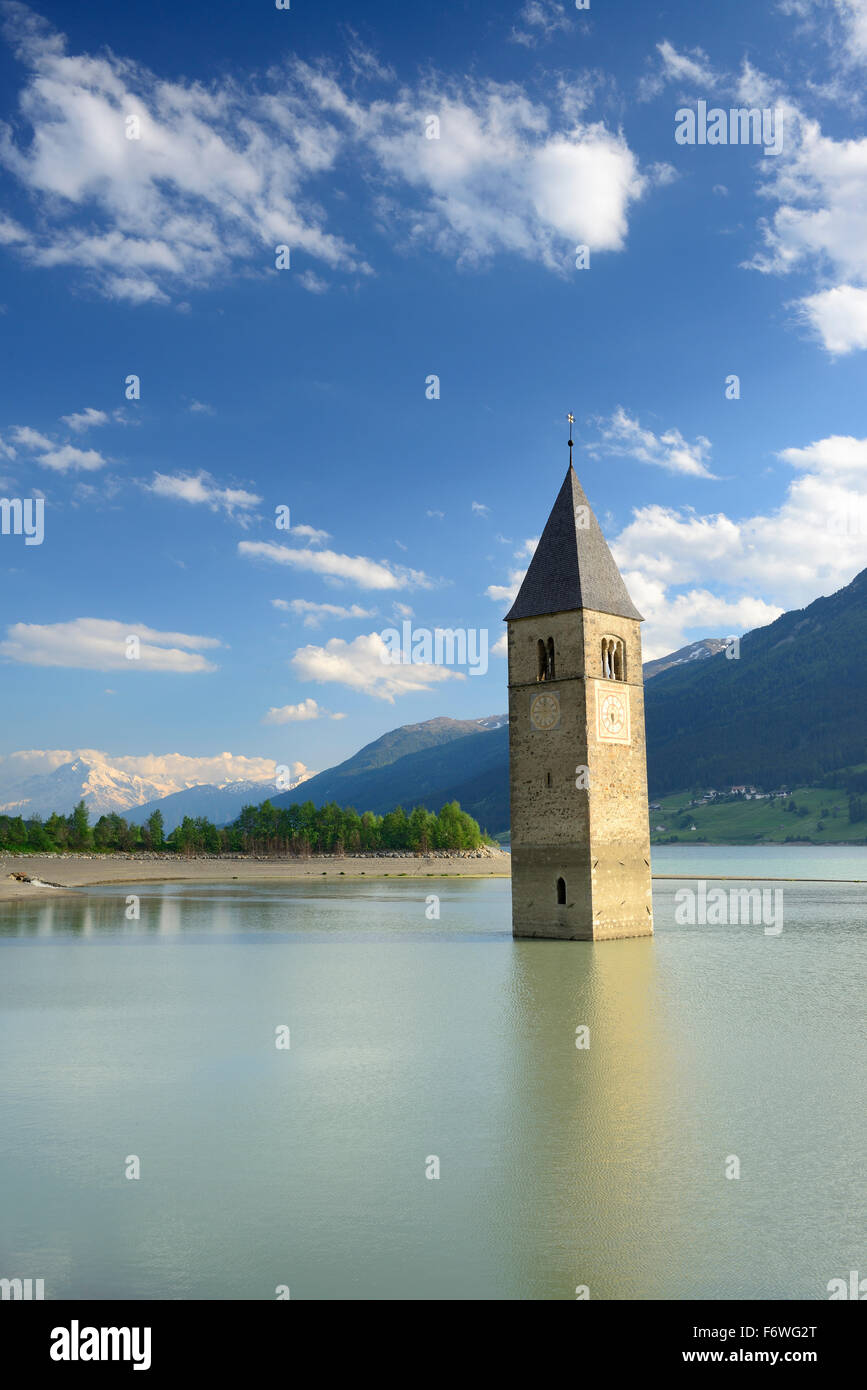 Bell tower in lake Reschensee, Ortler in the background, Reschen, lake ...