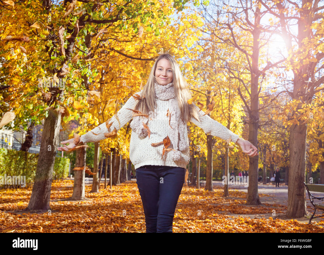 Happy woman autumn leaves hi-res stock photography and images - Alamy