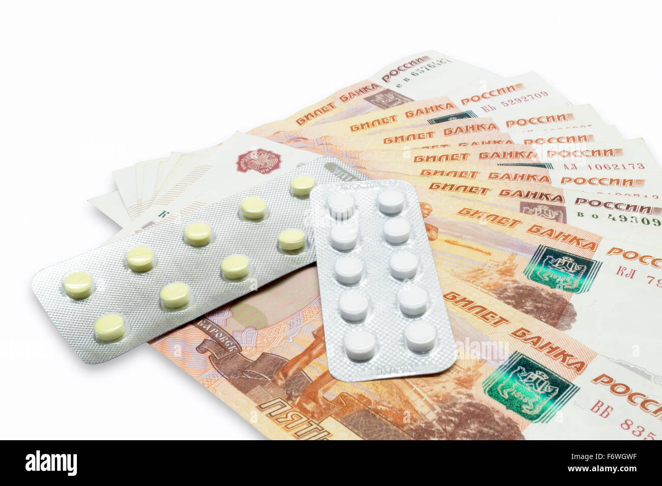 Money bills with medical tablet are insulated on white background Stock ...