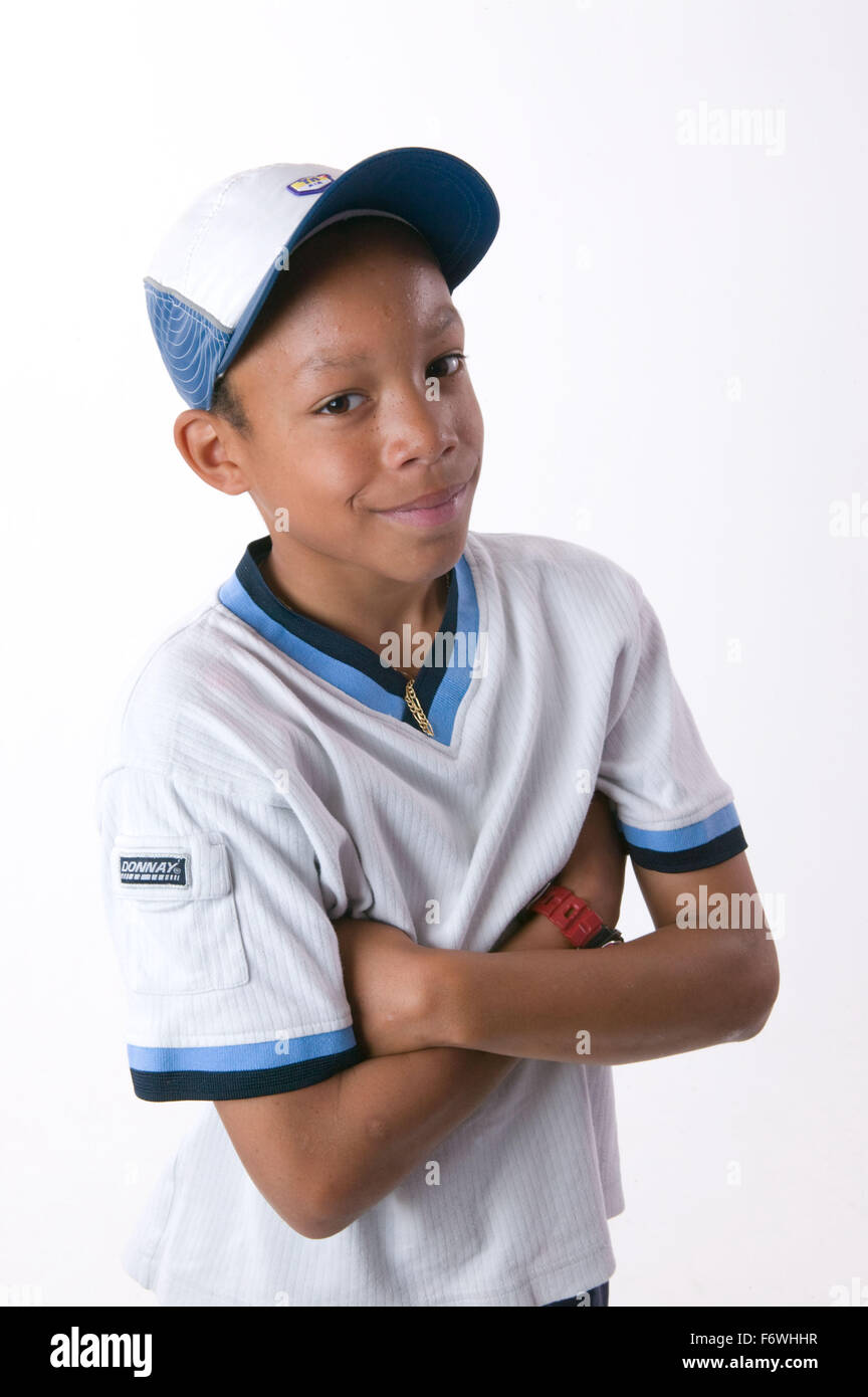 Portrait of a teenaged boy wearing a baseball cap Stock Photo - Alamy