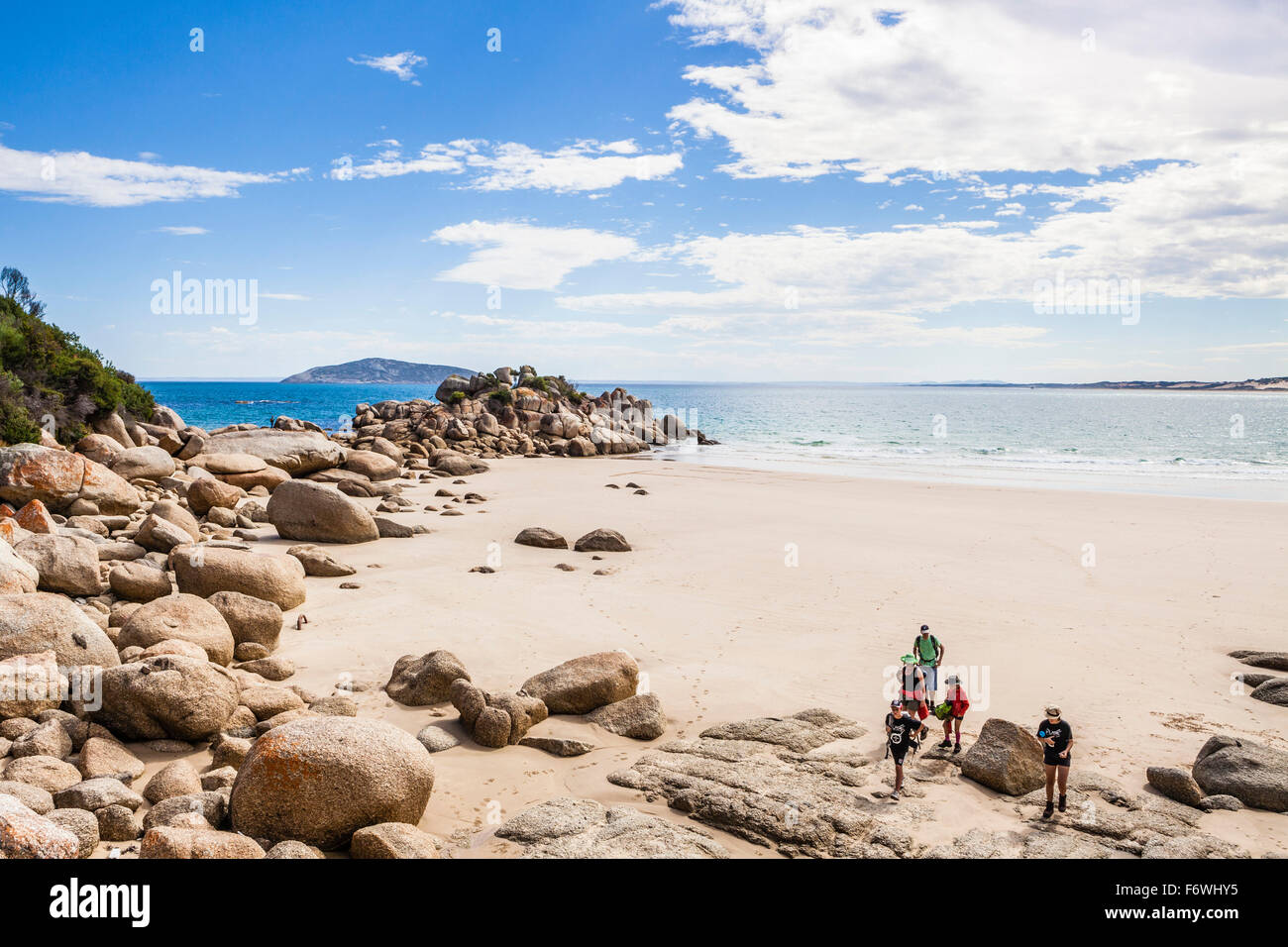 A group of people at the beach of Fairy Cove, Wilsons Promontory ...