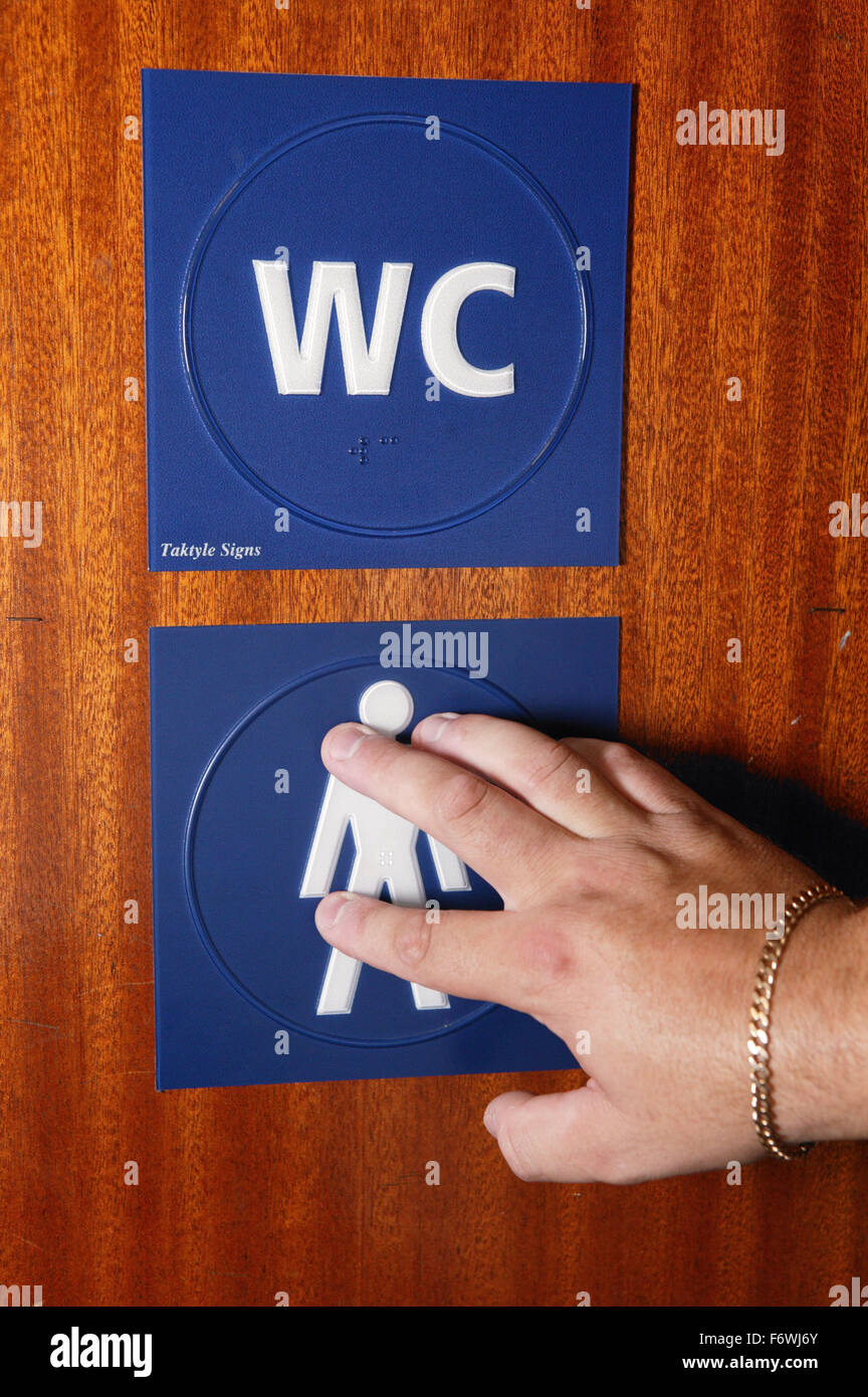 Access to services WC sign Stock Photo - Alamy