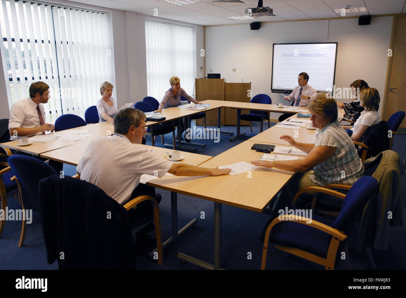 Group of employees at a teamwork meeting at NHS Octavia House Stock ...