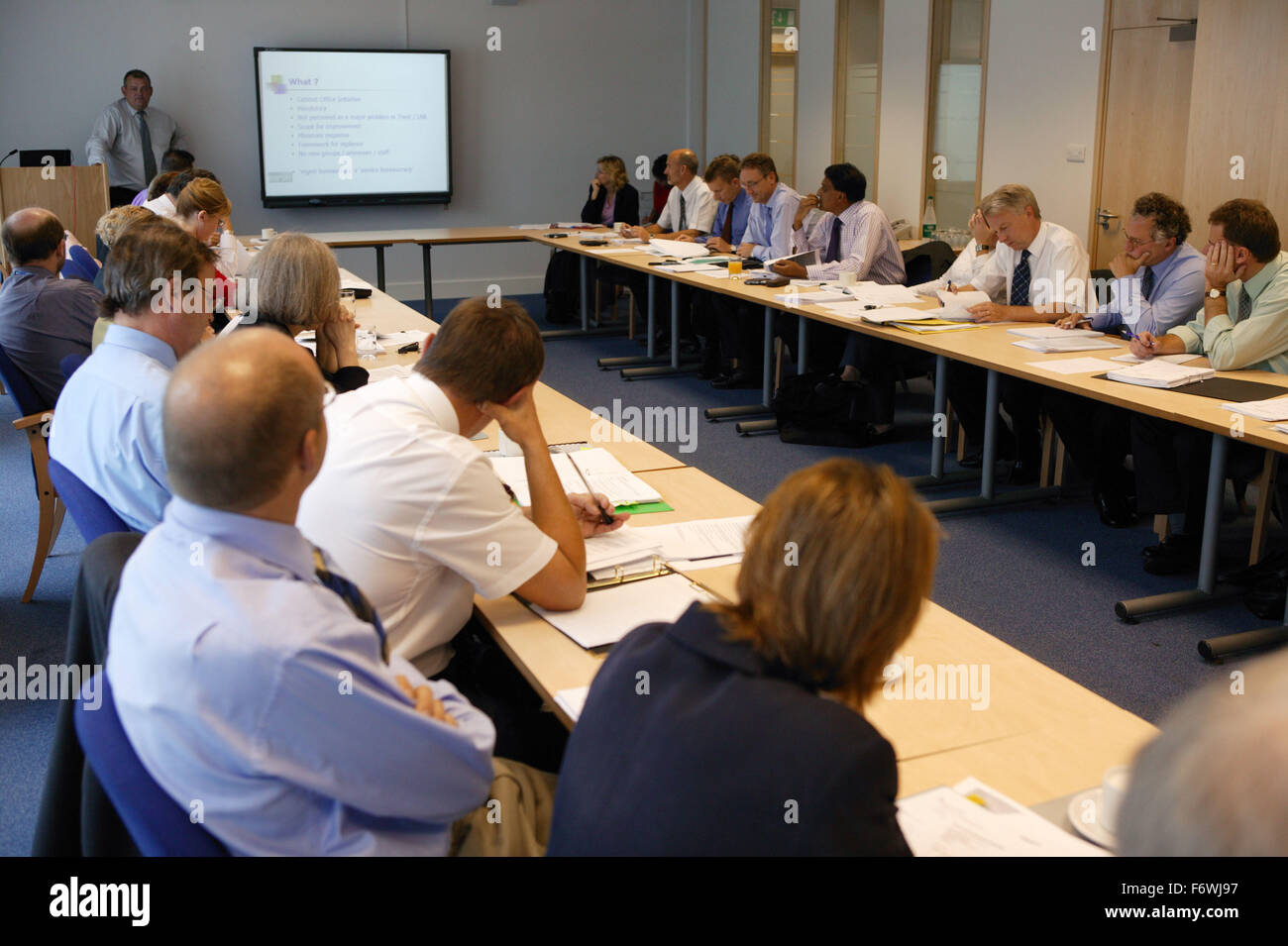 Group of employees at an NHS teamwork meeting Stock Photo - Alamy
