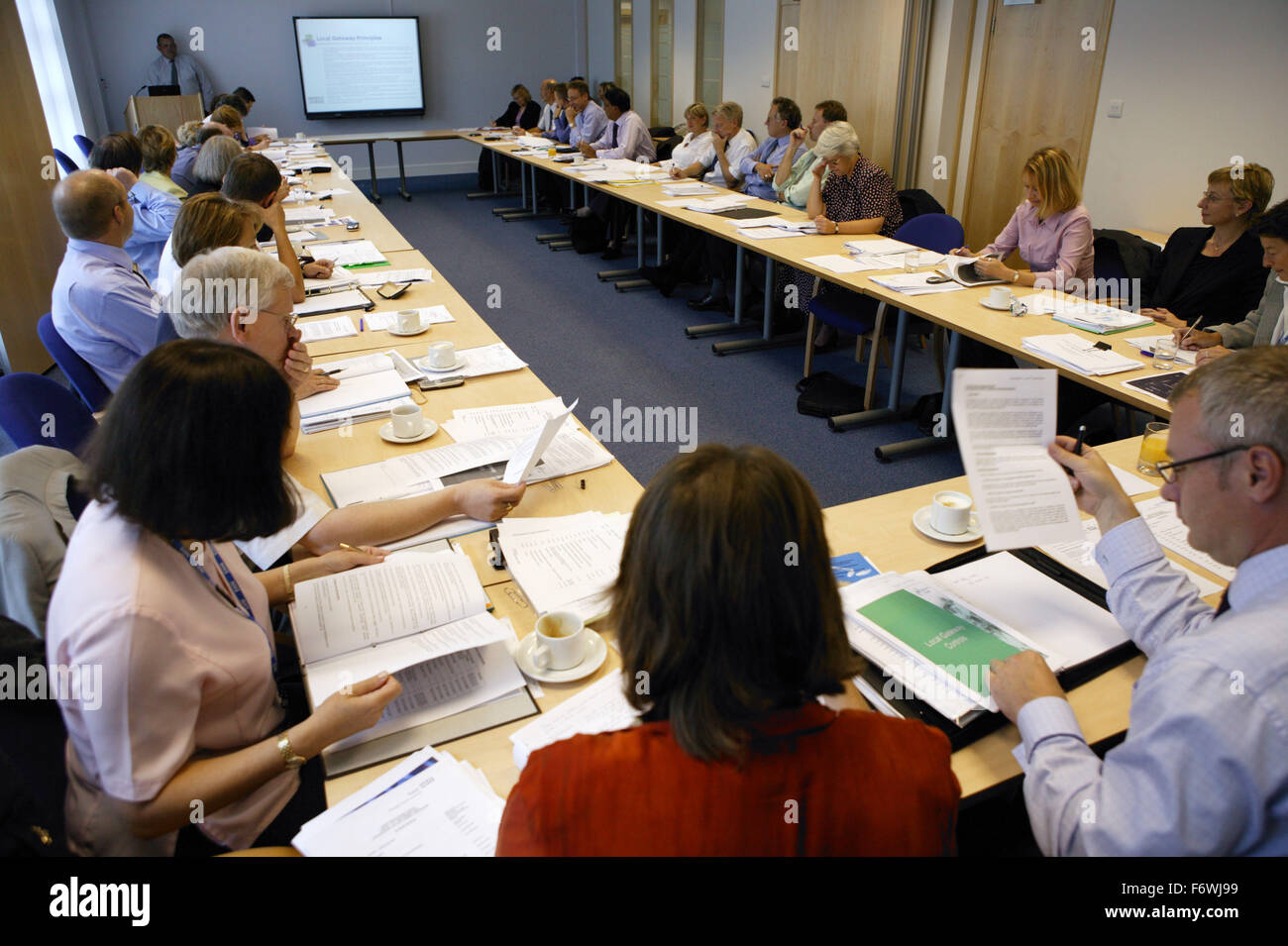 Group of employees at an NHS teamwork meeting Stock Photo - Alamy