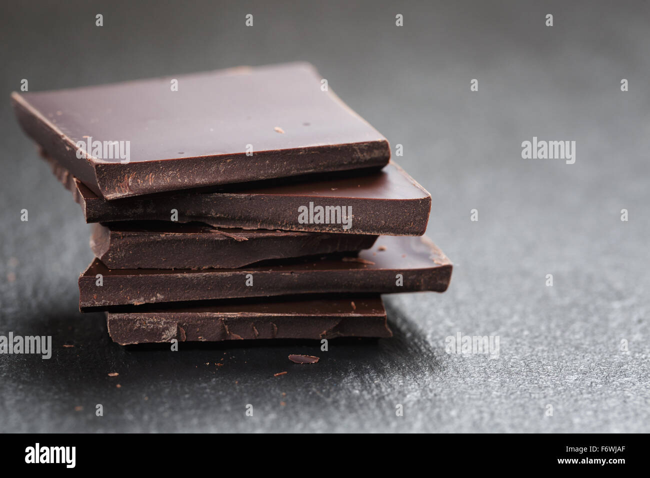 stack of thin chocolate bars on slate Stock Photo - Alamy