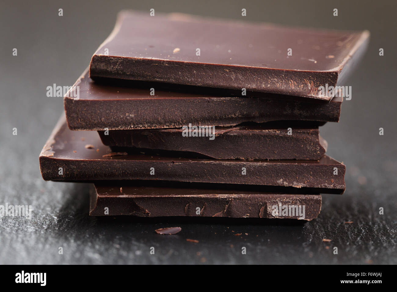 stack of thin chocolate bars on slate Stock Photo - Alamy