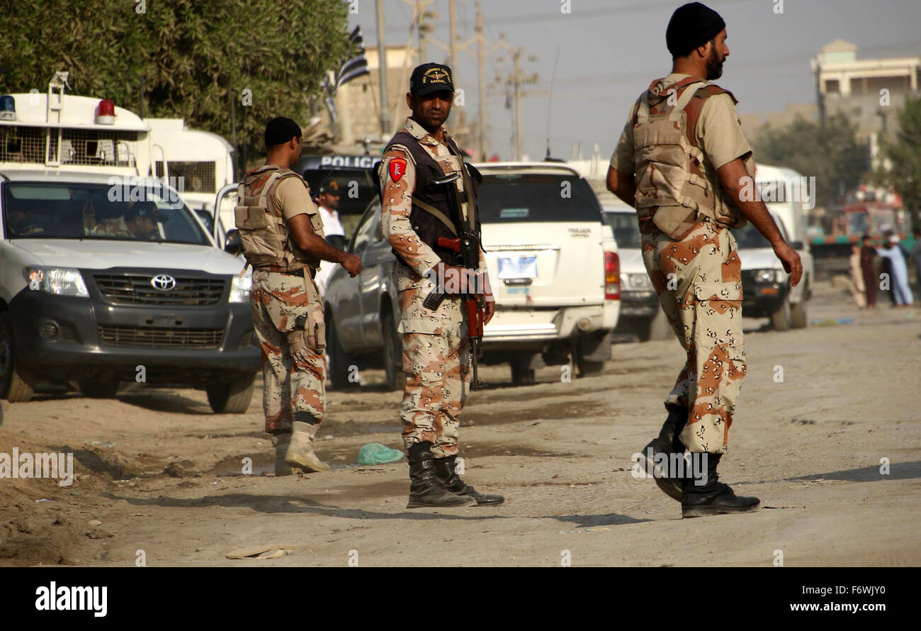 Karachi, Pakistan. 20th Nov, 2015. Pakistani security officials stand ...