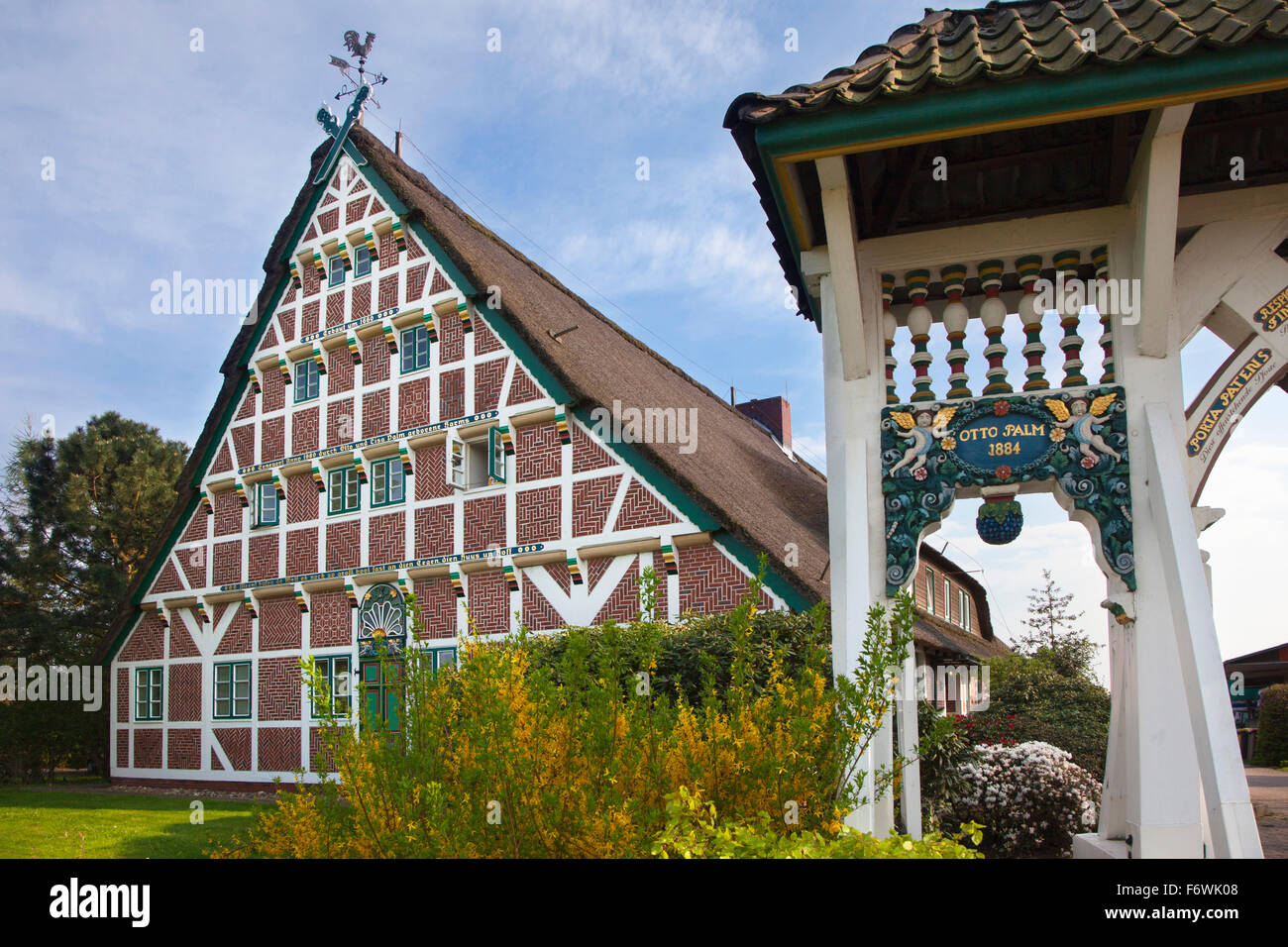 Prunkpforte magnificent gate in front of a half-timbered house with ...