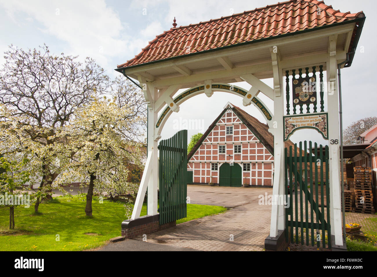 Prunkpforte magnificent gate in front of a half-timbered house with ...