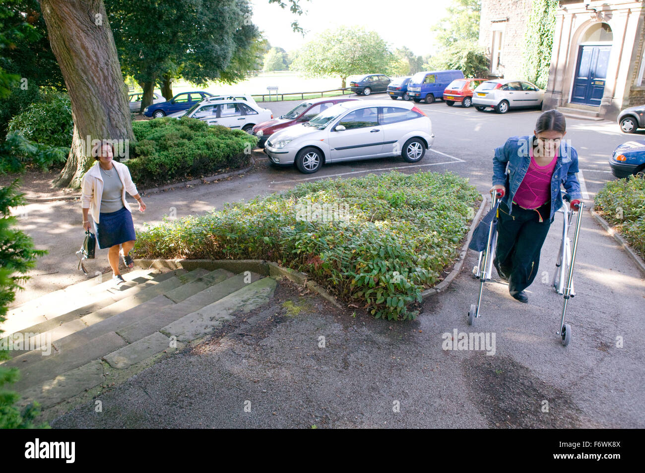 Different paths of access: conventional steps or a smooth ramp for ...