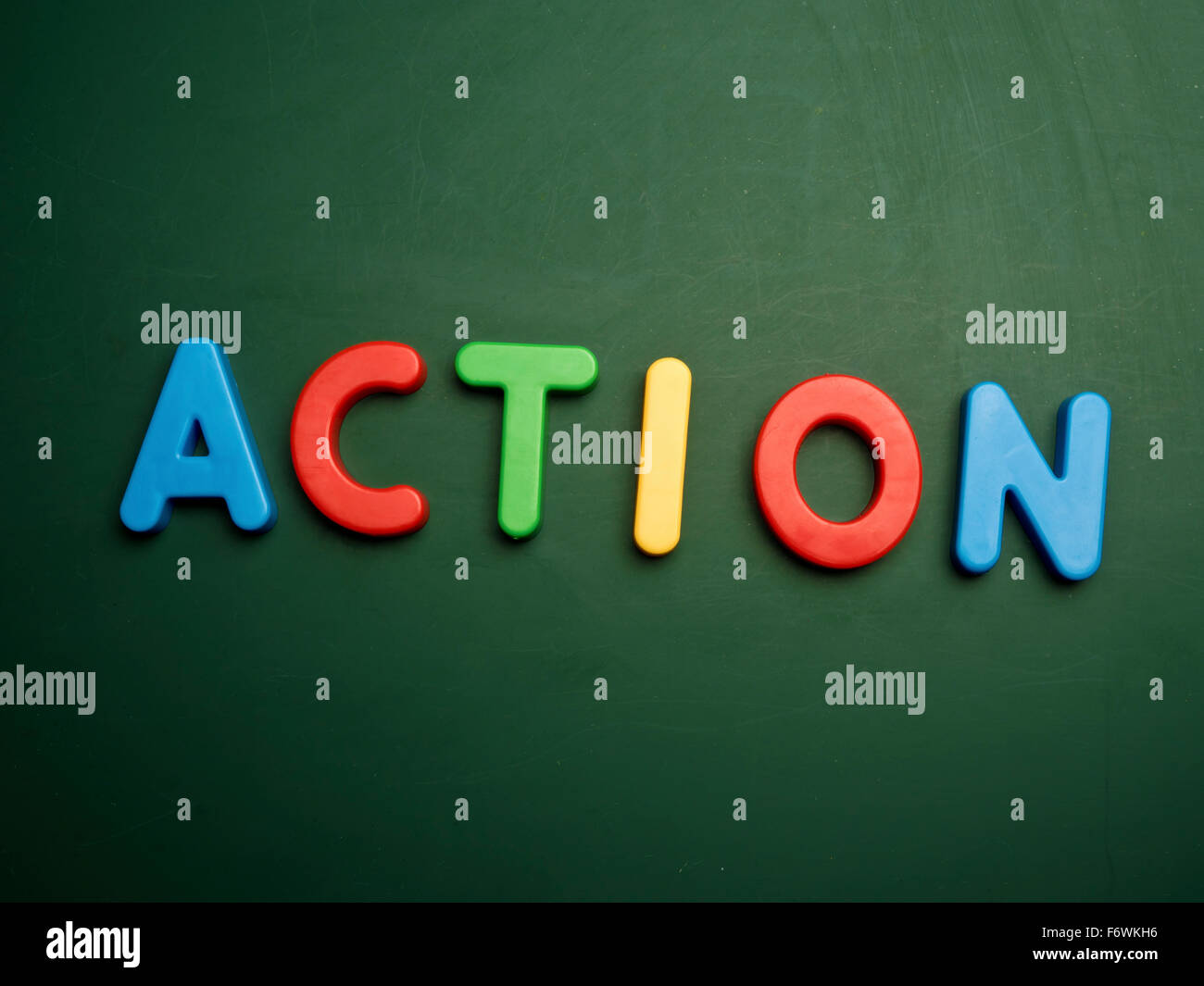 action concept in colorful letters isolated on blank blackboard Stock ...