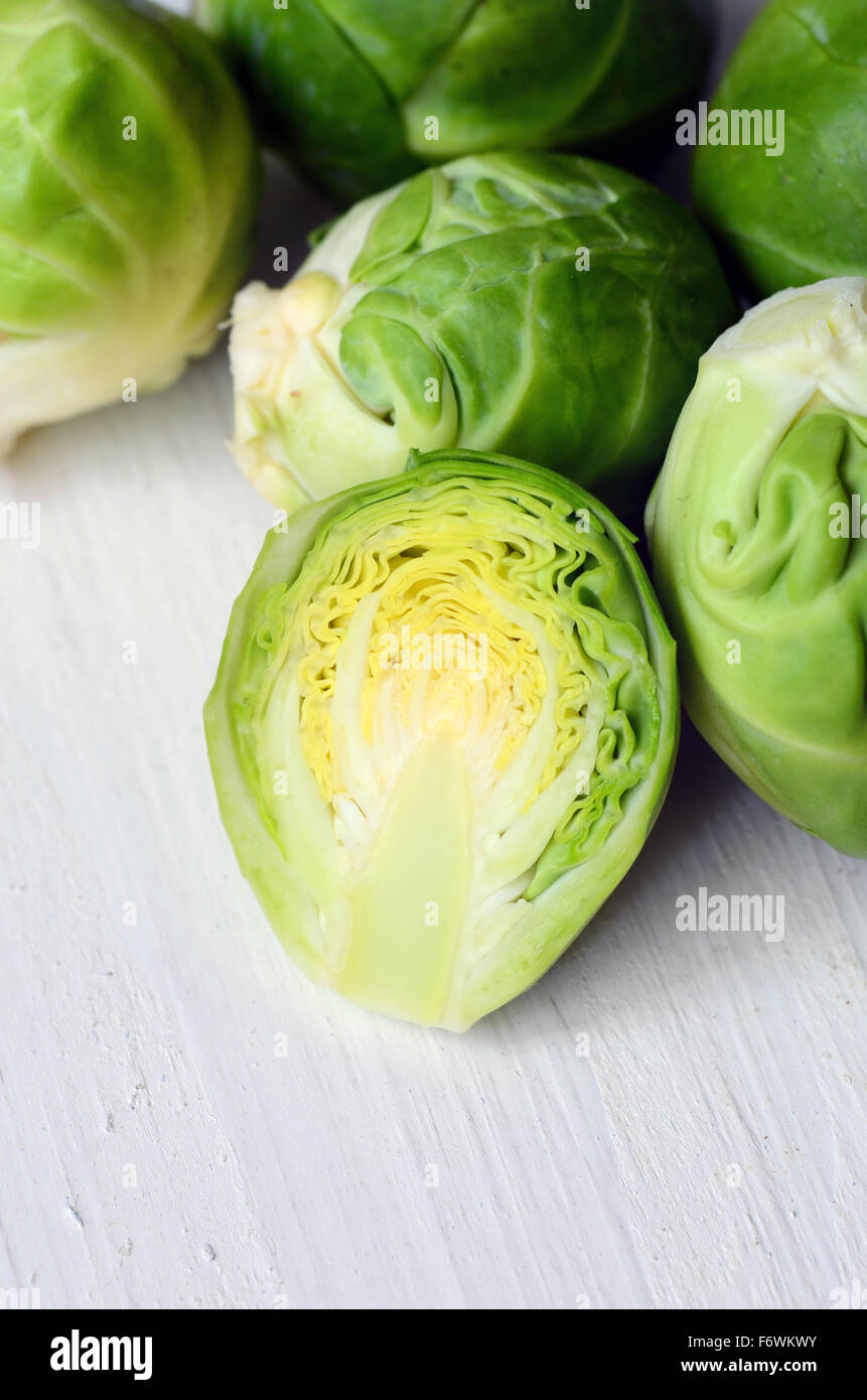 Fresh brussel sprouts on white wooden background Stock Photo - Alamy