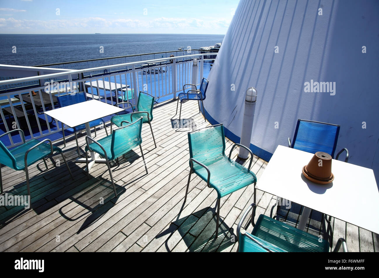 Color image with chairs and tables on the deck of a ferry Stock Photo ...