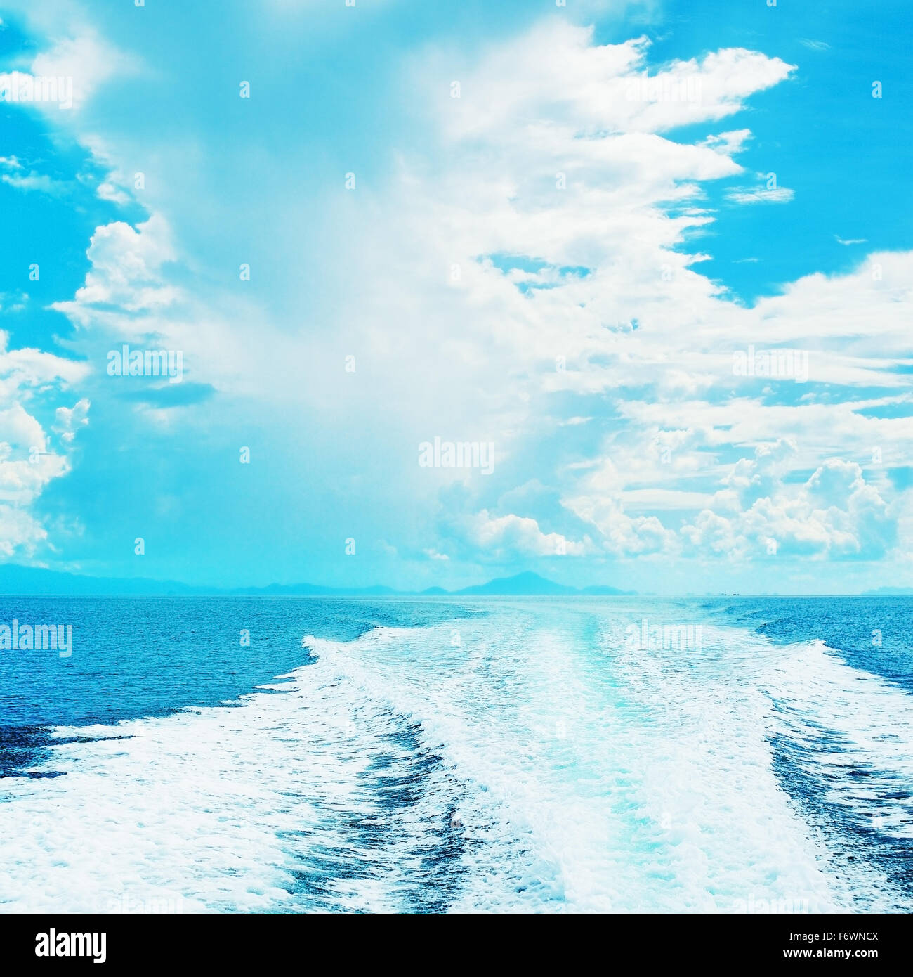 sea with trail of speedboat at sunny day Stock Photo - Alamy