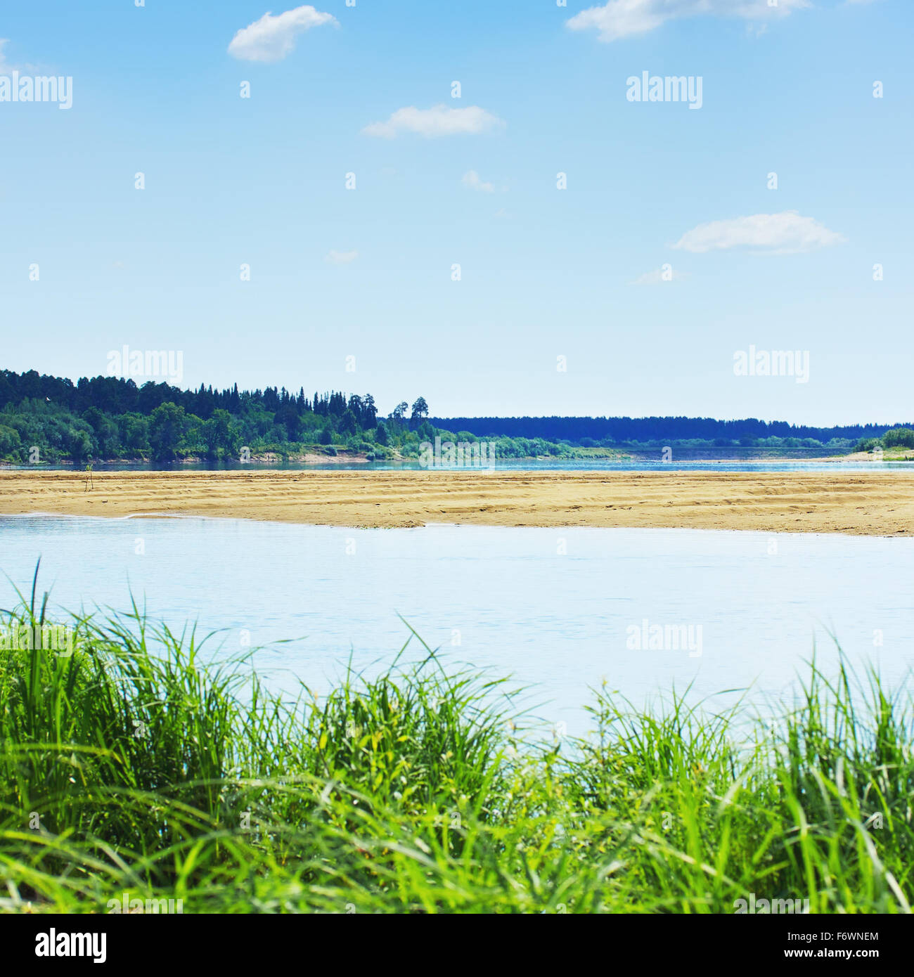 calm river under blue sky at summer day Stock Photo - Alamy