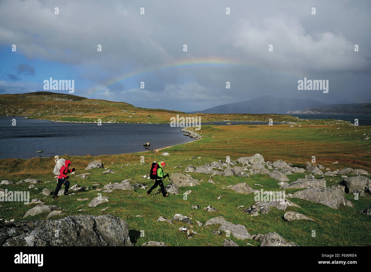 Hikers at Loch Crabhadail, Harris, Lewis and Harris, Outer Hebrides ...