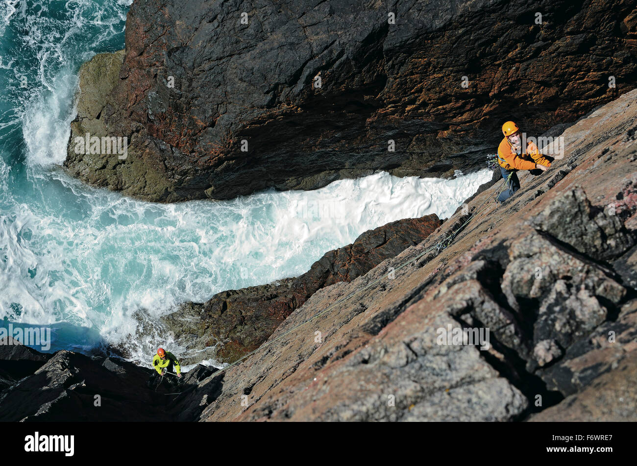 Man climbing in the cliffs of Sheigra, Highlands, Scotland, Great ...