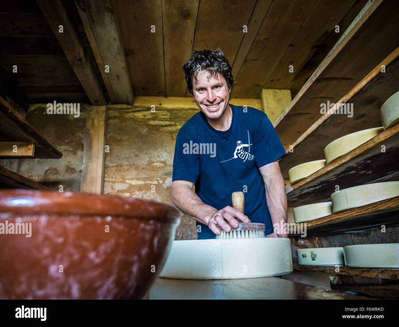 Man making cheese, Bodme Alp, Gstaad, Canton of Bern, Switzerland Stock ...