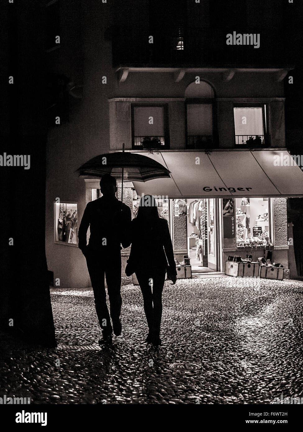 Couple walking at night hi-res stock photography and images - Alamy