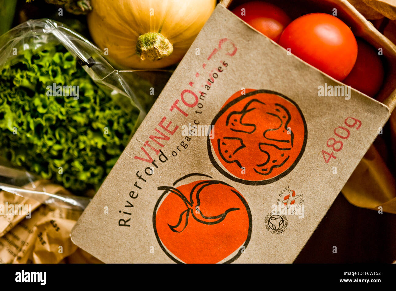 riverford organic vege box tomatoe asparagus Stock Photo - Alamy