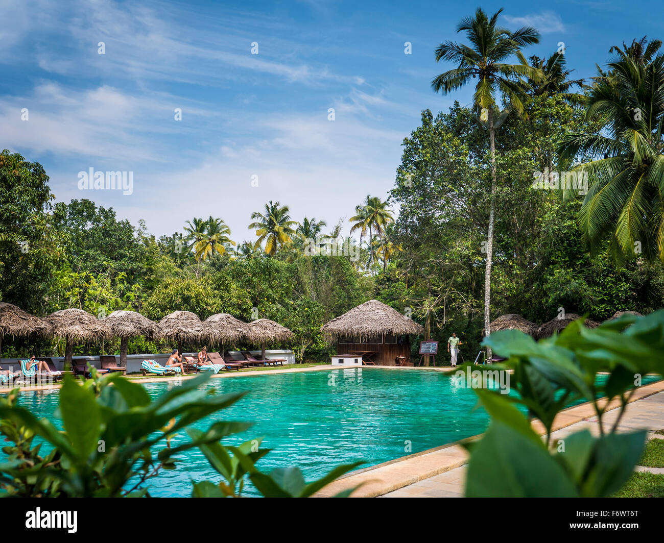 Hotel guests in the swimming pool hi-res stock photography and images ...