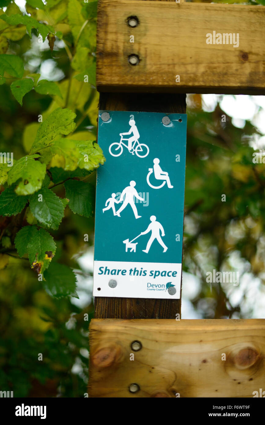 "Share this space" sign along a communal path Stock Photo - Alamy