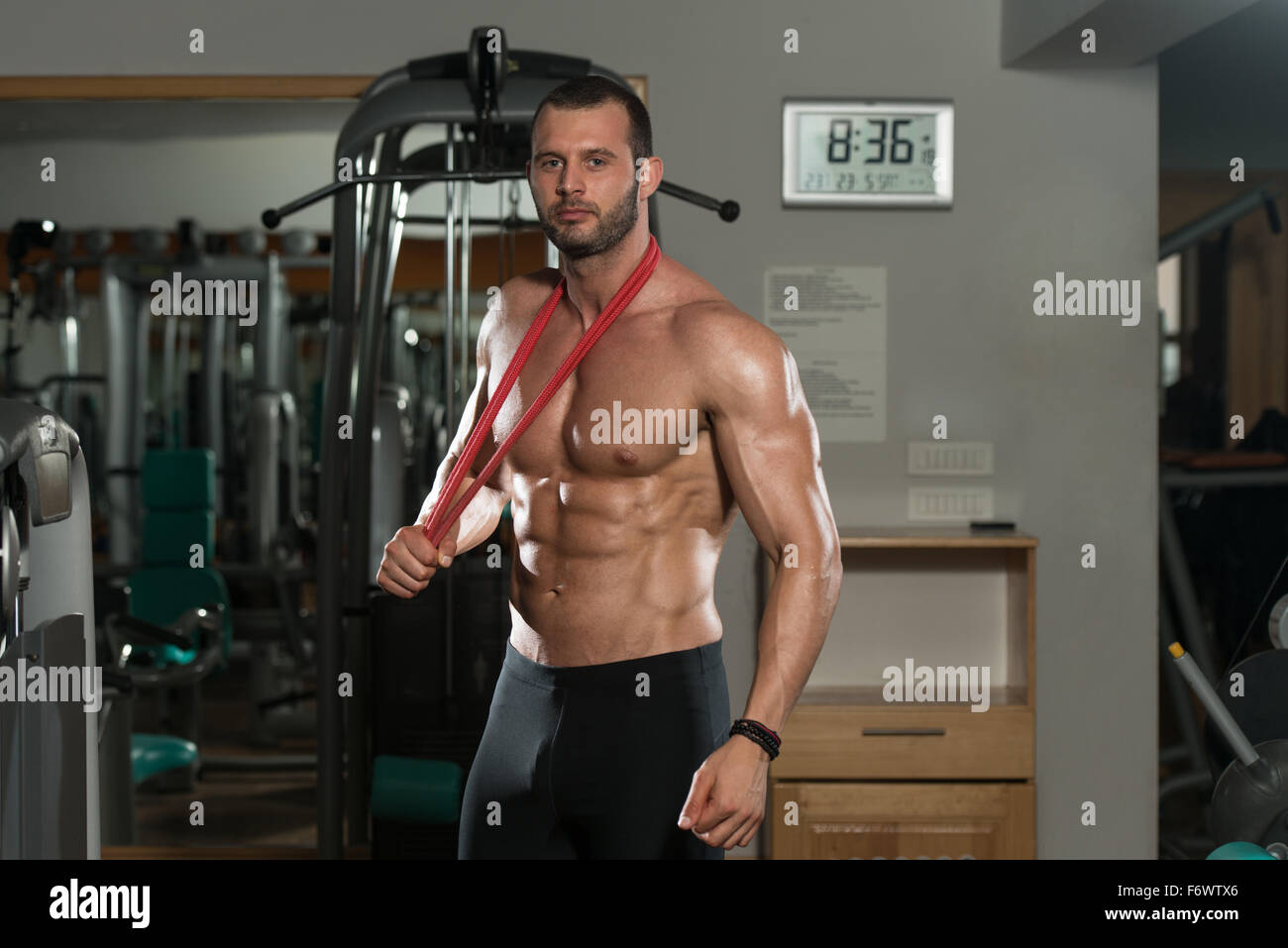Handsome Muscular Man With Jumping Rope Stock Photo - Alamy