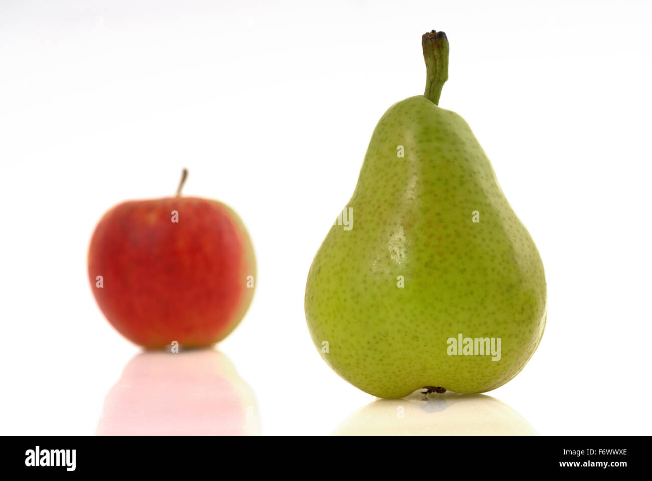 Red apple and green pear food fruit fruits studio Stock Photo - Alamy