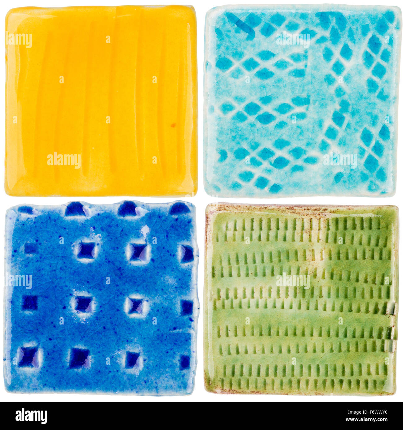 Handmade glazed ceramic tiles isolated on white Stock Photo - Alamy