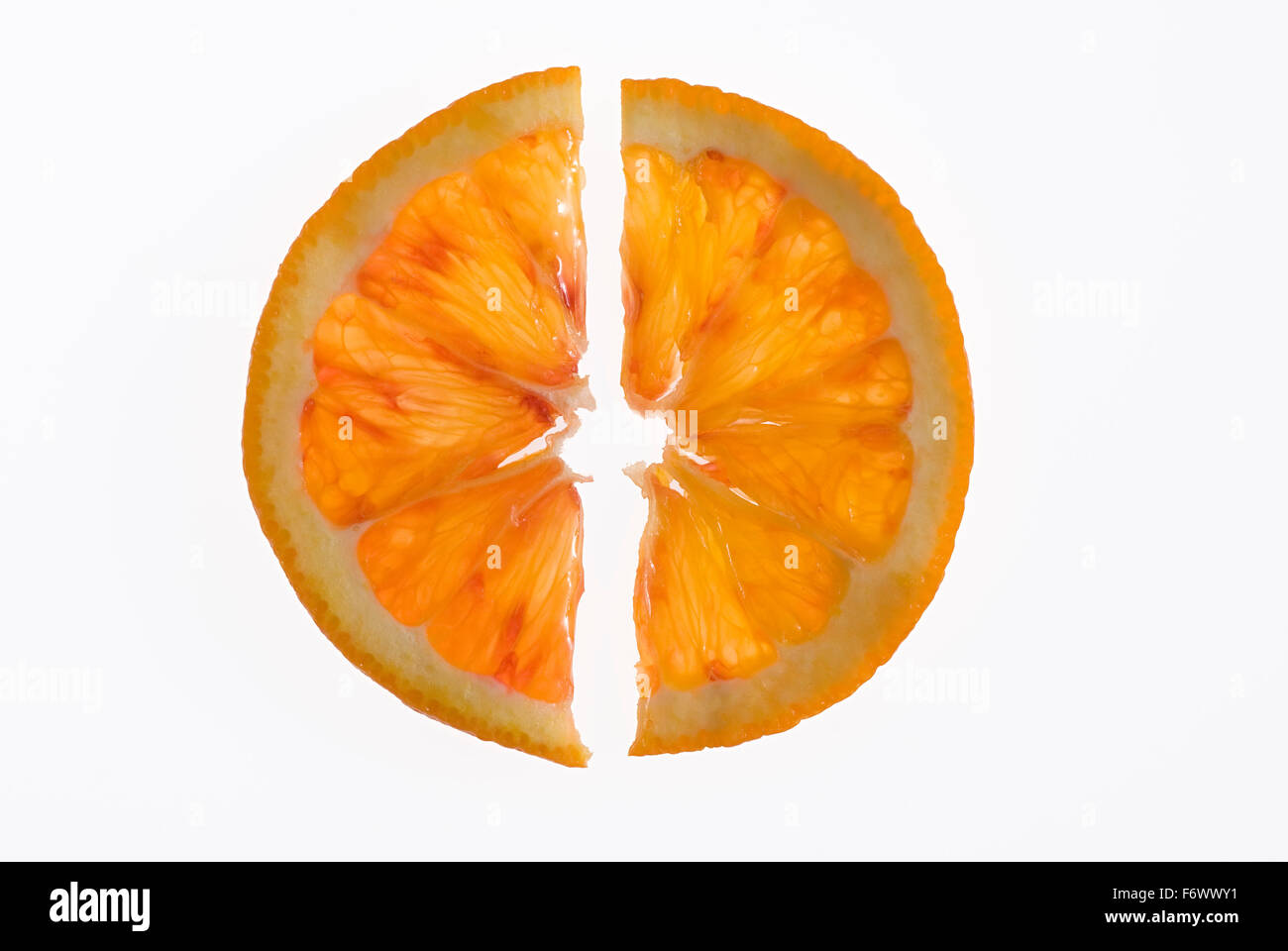 Two halves of a orange slice Stock Photo - Alamy