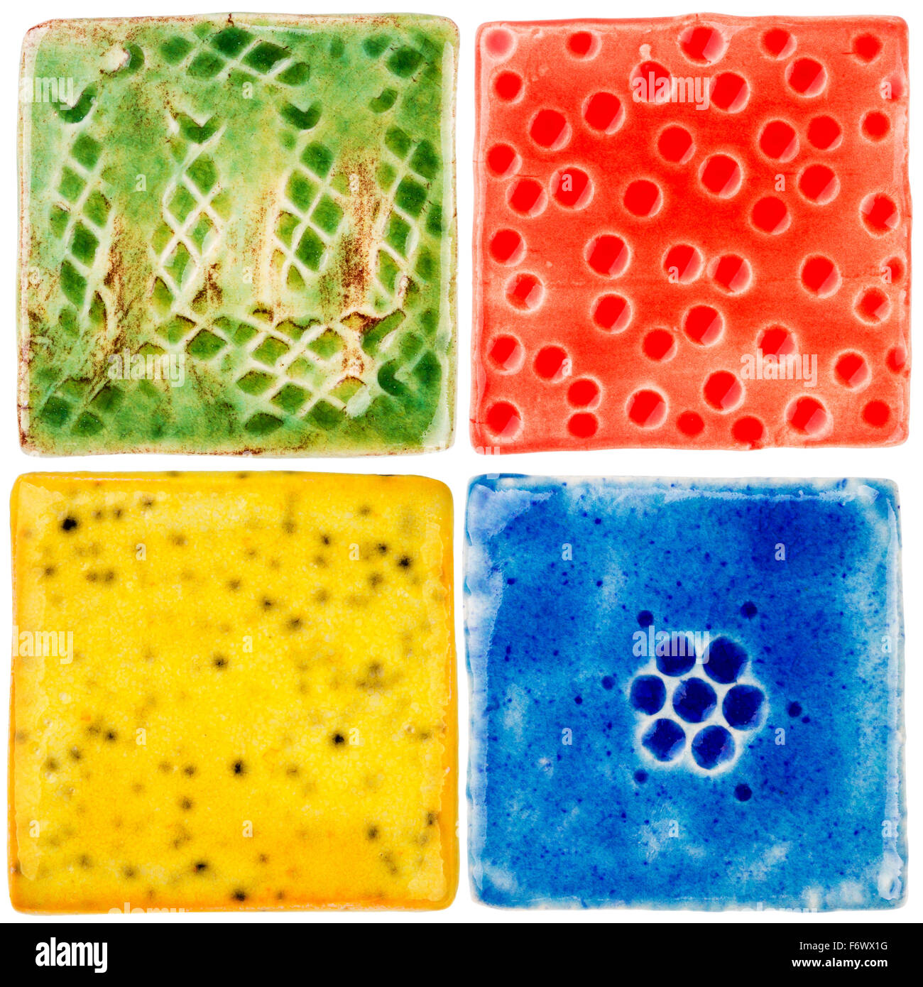 Handmade glazed ceramic tiles isolated on white Stock Photo - Alamy