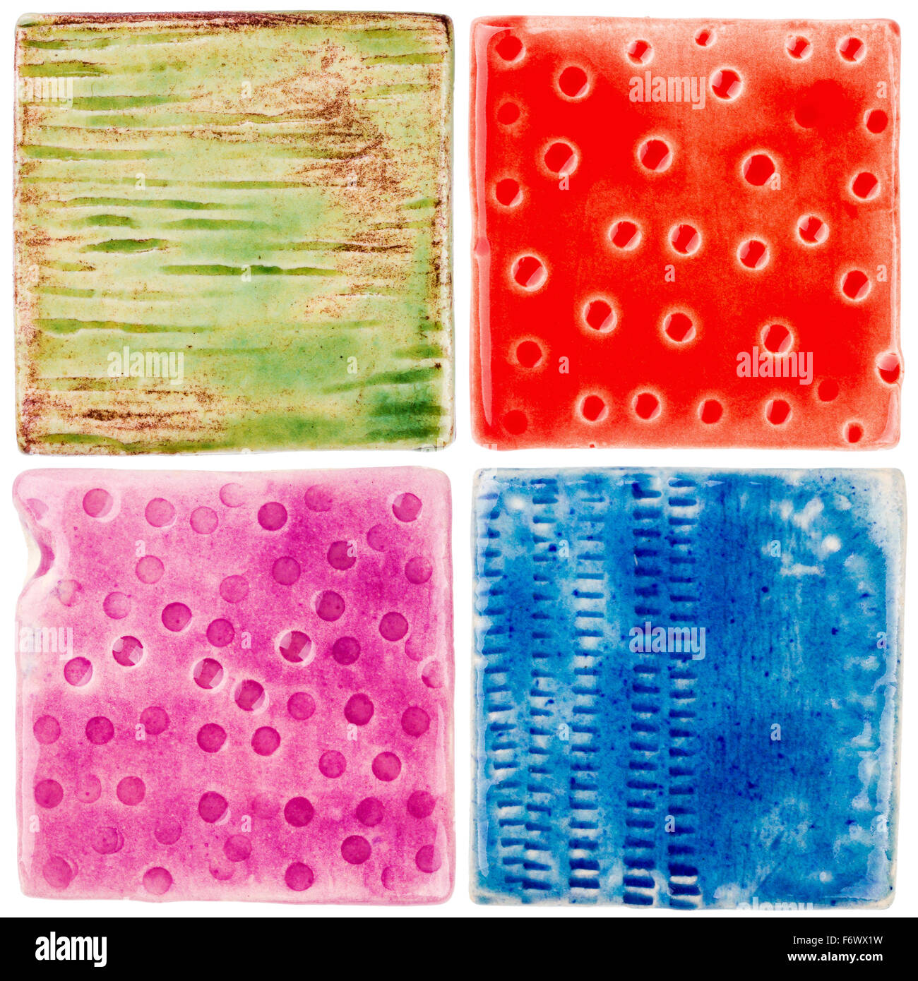 Handmade glazed ceramic tiles isolated on white Stock Photo - Alamy