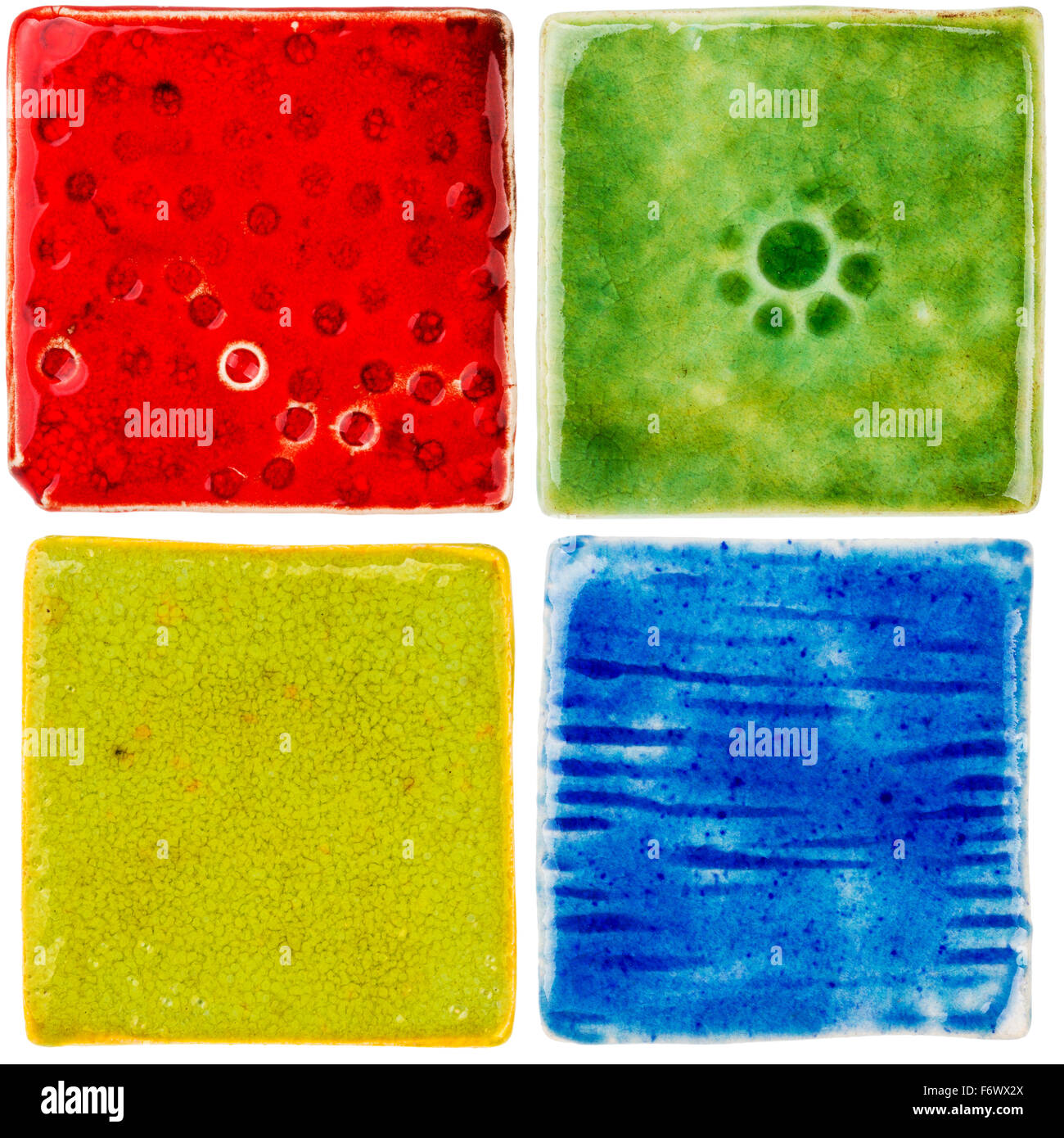 Handmade glazed ceramic tiles isolated on white Stock Photo - Alamy