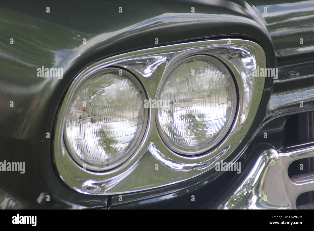 Dual headlights on a 1950's automobile Stock Photo - Alamy