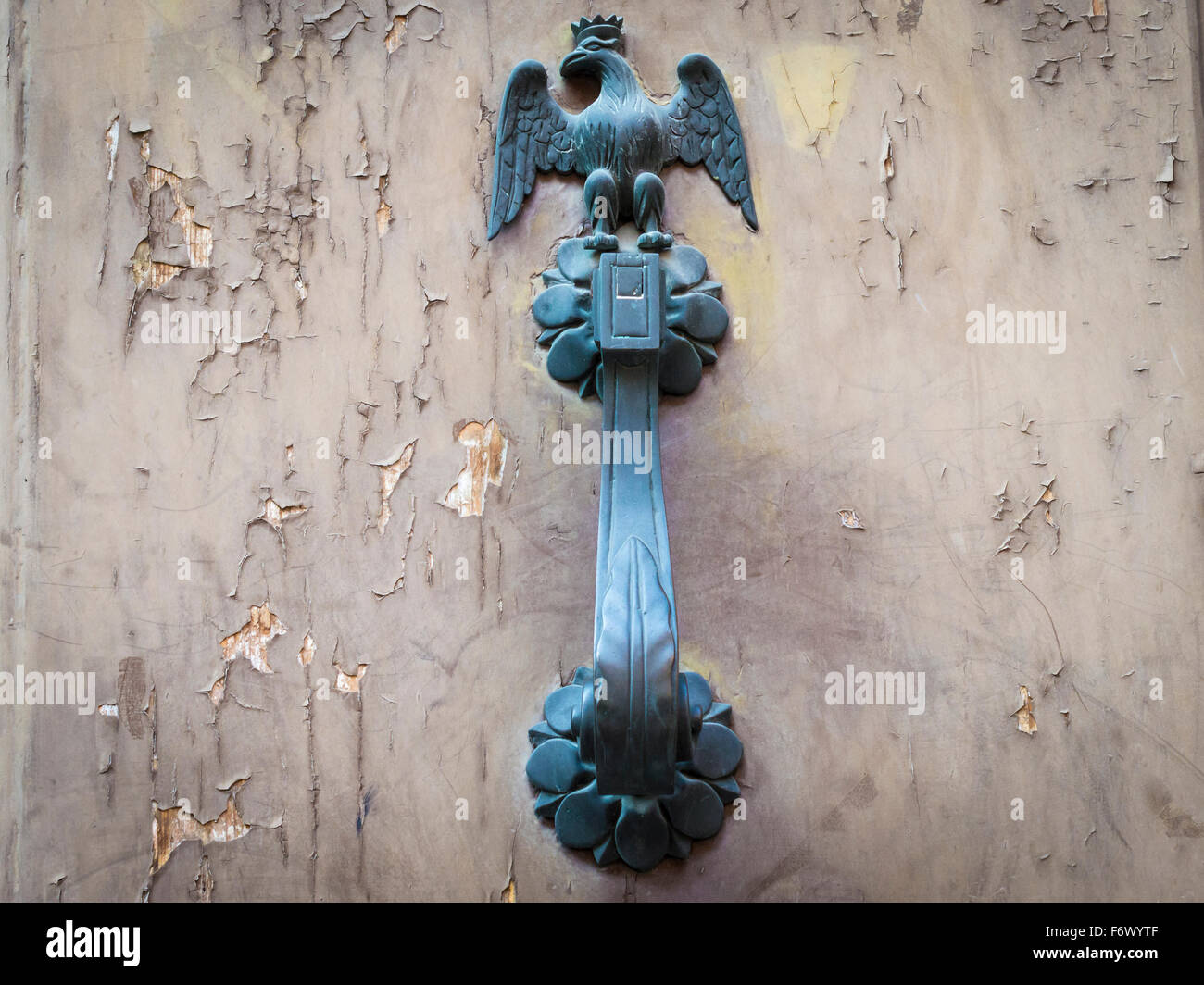 Eagle symbol door handle Stock Photo - Alamy