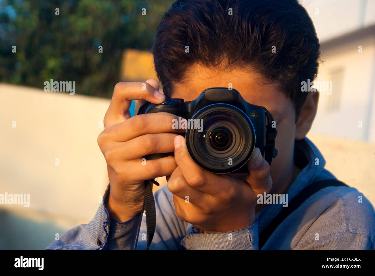 Caucasian Boy with Camera. Caucasian Boy with his point and shoot ...