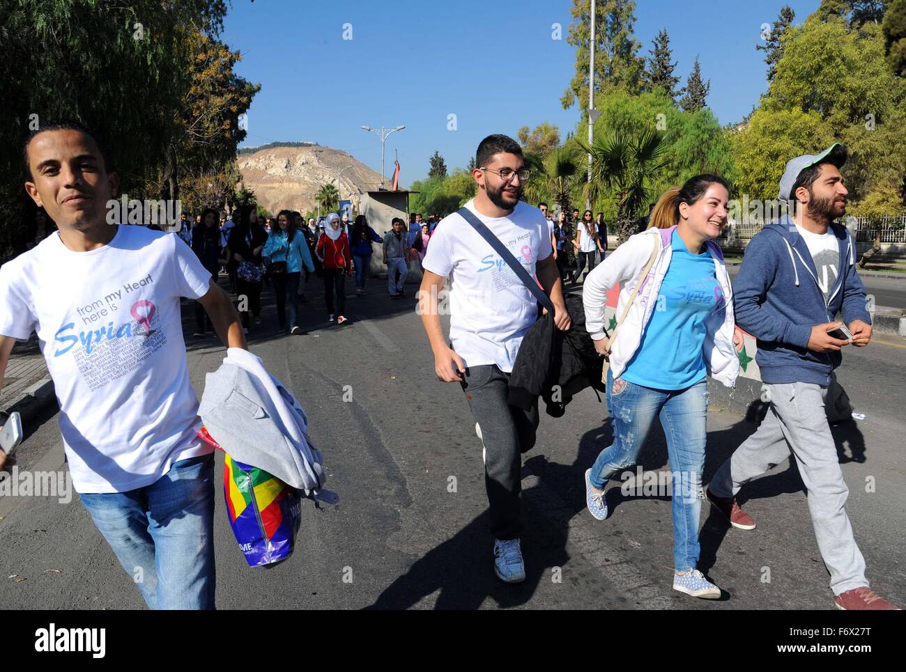 Damascus, Syria. 20th Nov, 2015. Syrians take part in a long walk as ...