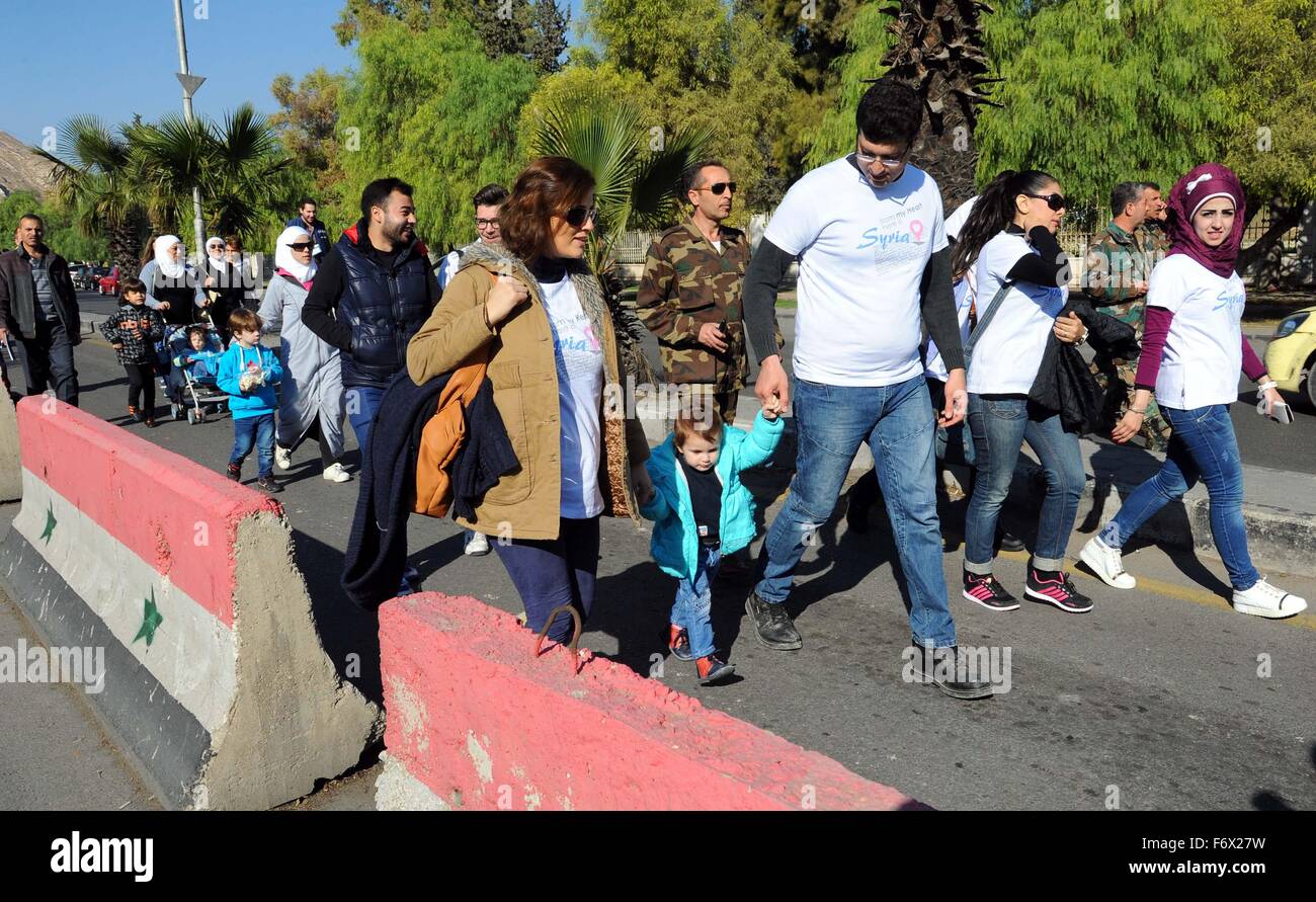Damascus, Syria. 20th Nov, 2015. Syrians take part in a long walk as ...