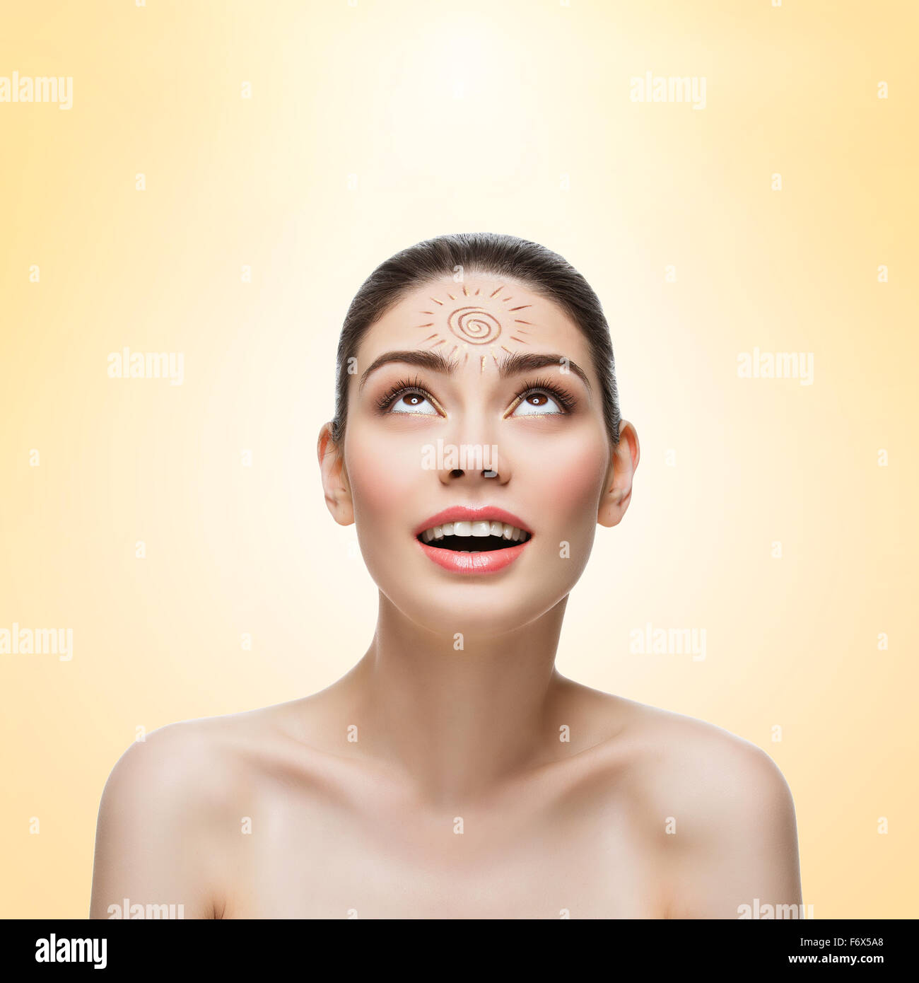 Beautiful girl with sun drawing Stock Photo - Alamy