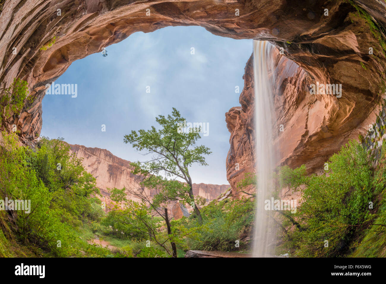 Flash flood waterfall in alcove, Colorado River, Utah, Near Moab, Utah ...