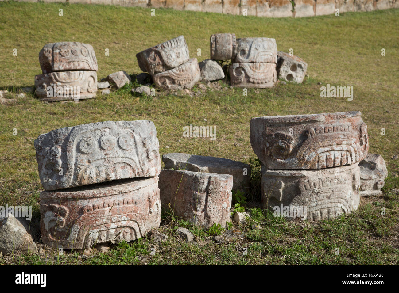 Stone glyphs in front of the Palace of Masks, Kabah archaeological site ...