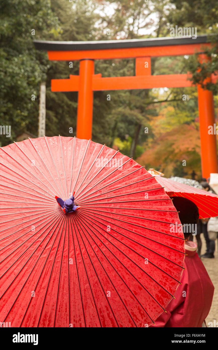 Japan Kyoto Two traditionally dressed female figures figures holding ...