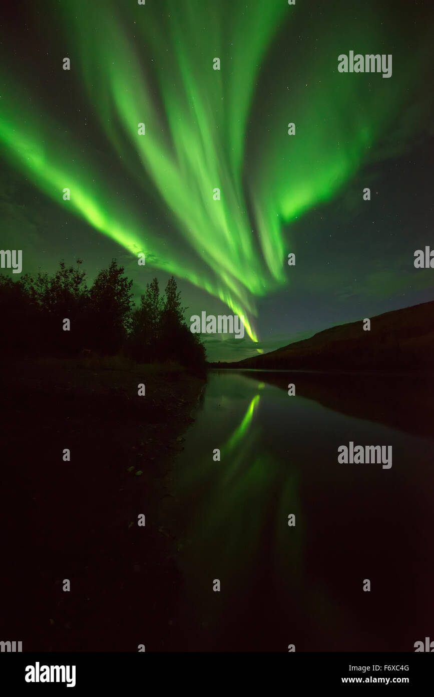 Northern Lights (aurora borealis) over the Pelly River; Ross River ...