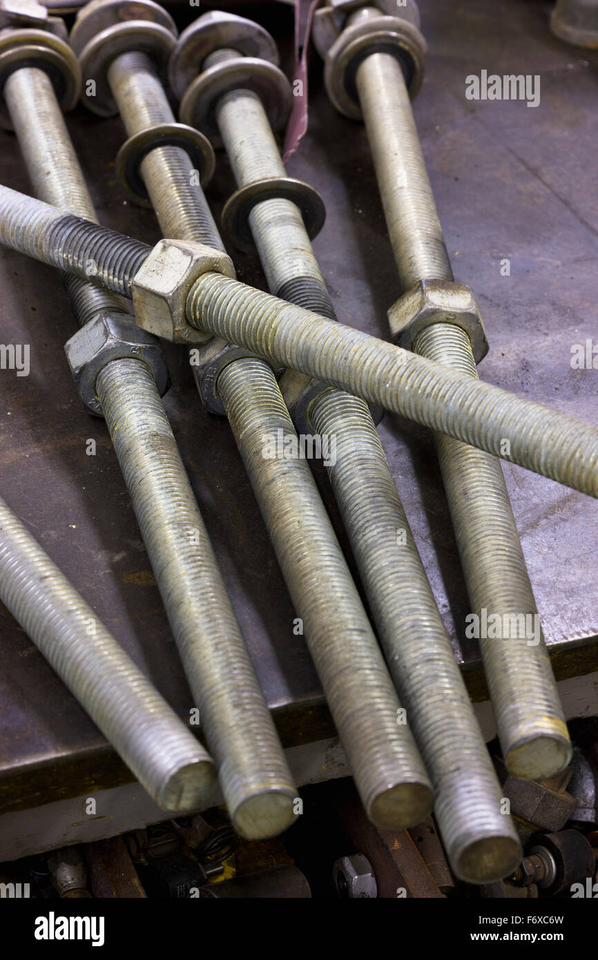 Close up of large bolts with nuts at an electrical power plant, Sand ...